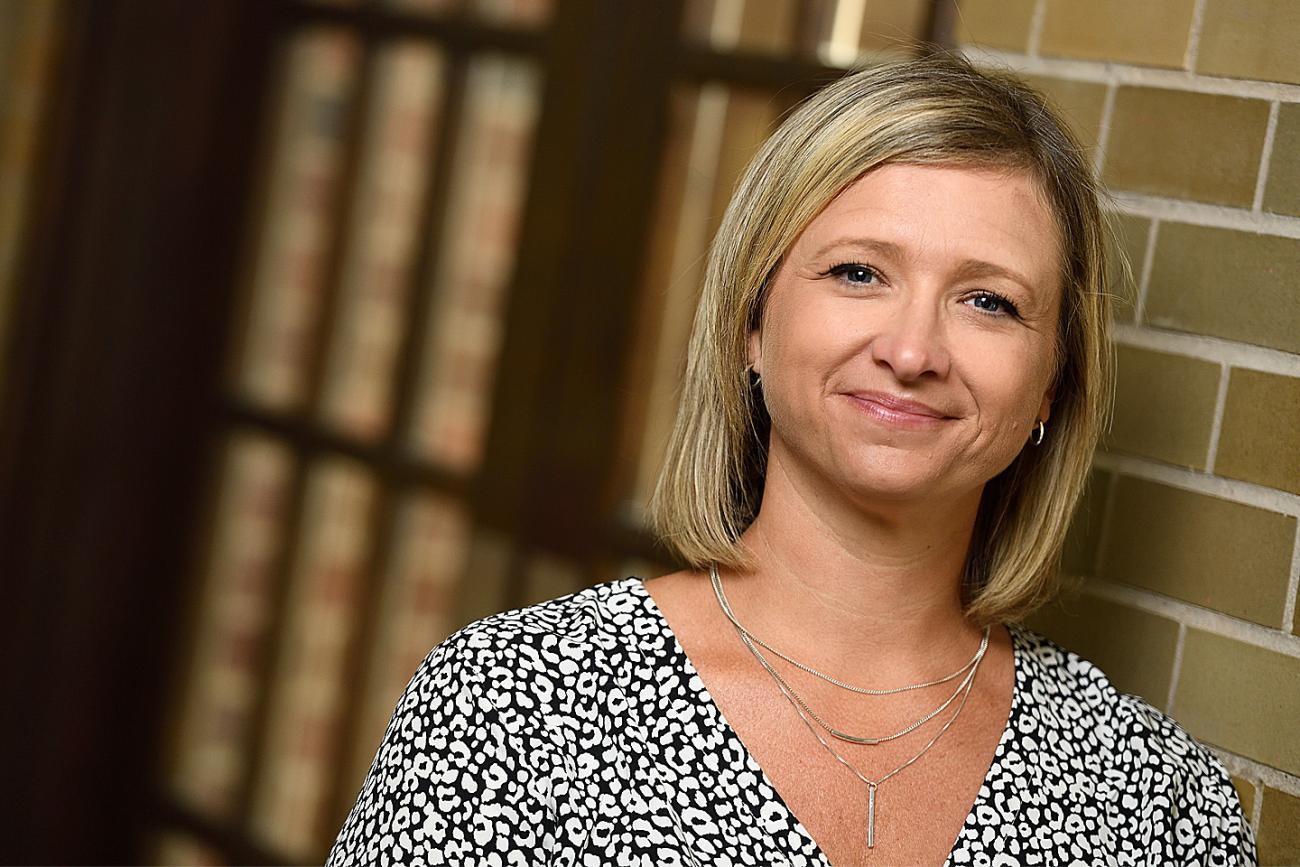 April Floyd oversees the university's newly enhanced tuition assistance ...